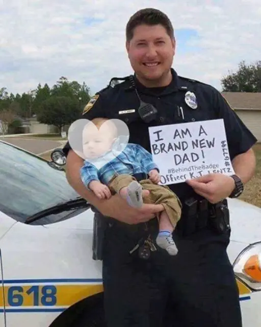 The Cop Held Up a Sign Saying “I’m a Brand New Dad” But the Baby Isn’t His
